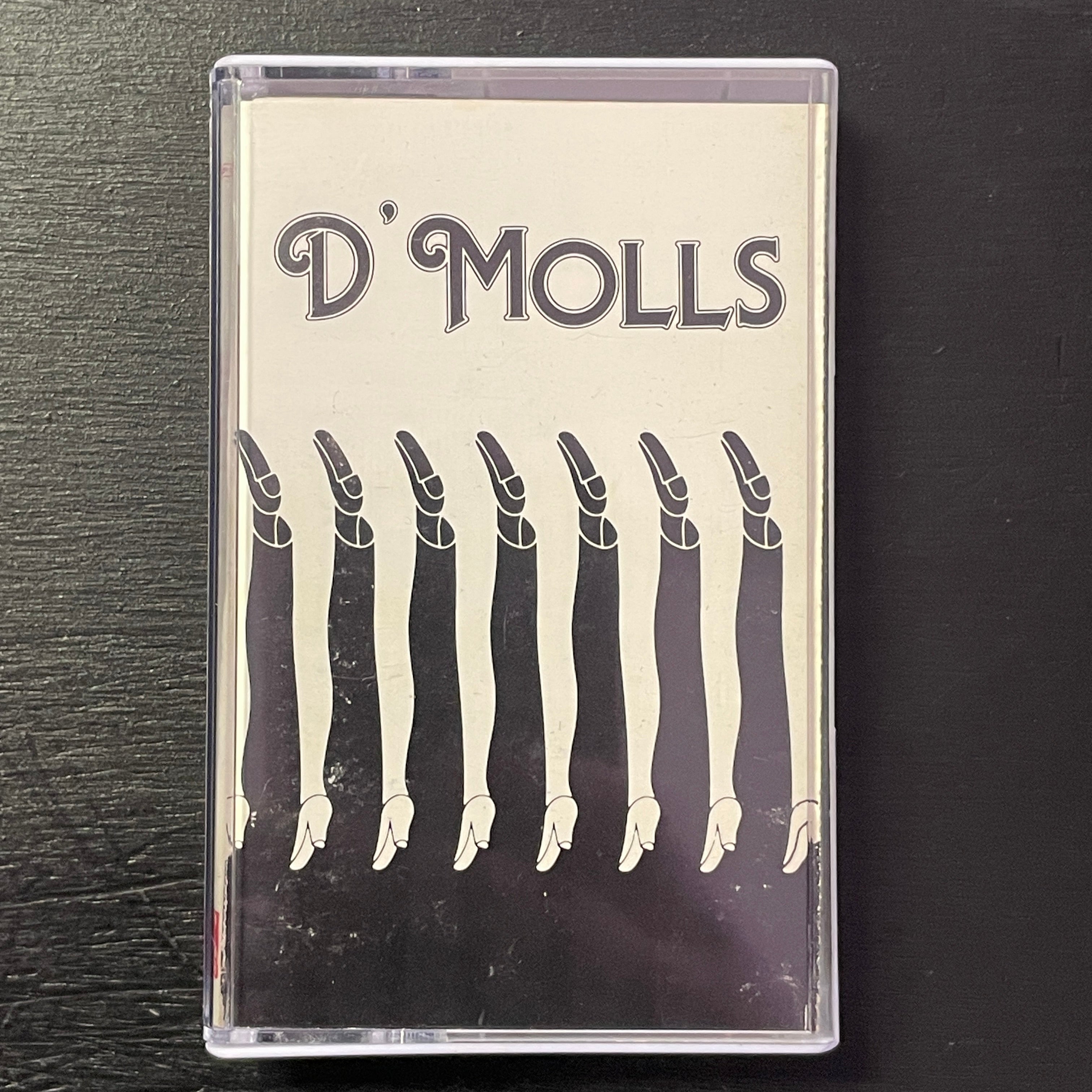 D' Molls – D' Molls original cassette tape (used) – Vinyl Command